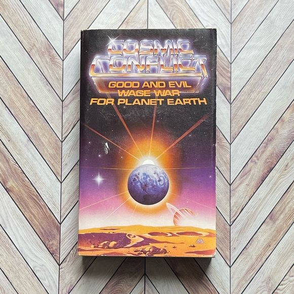 Accents | Used Paperback Book Cosmic Conflict Good And Evil Wage War ...